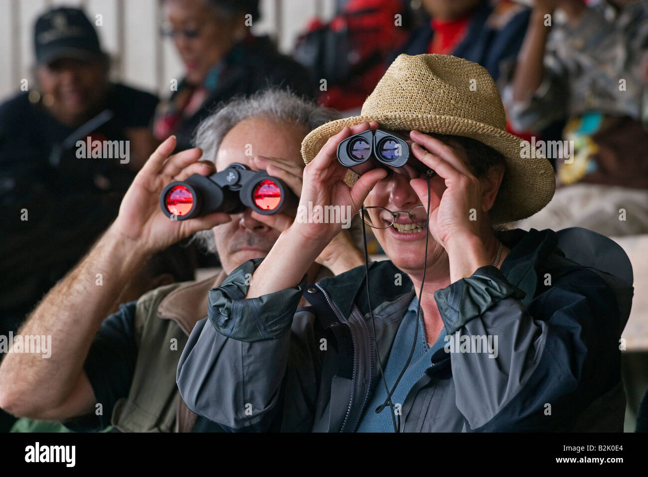 JAZZ FANS check out a performance with their binoculars during the 50th ...