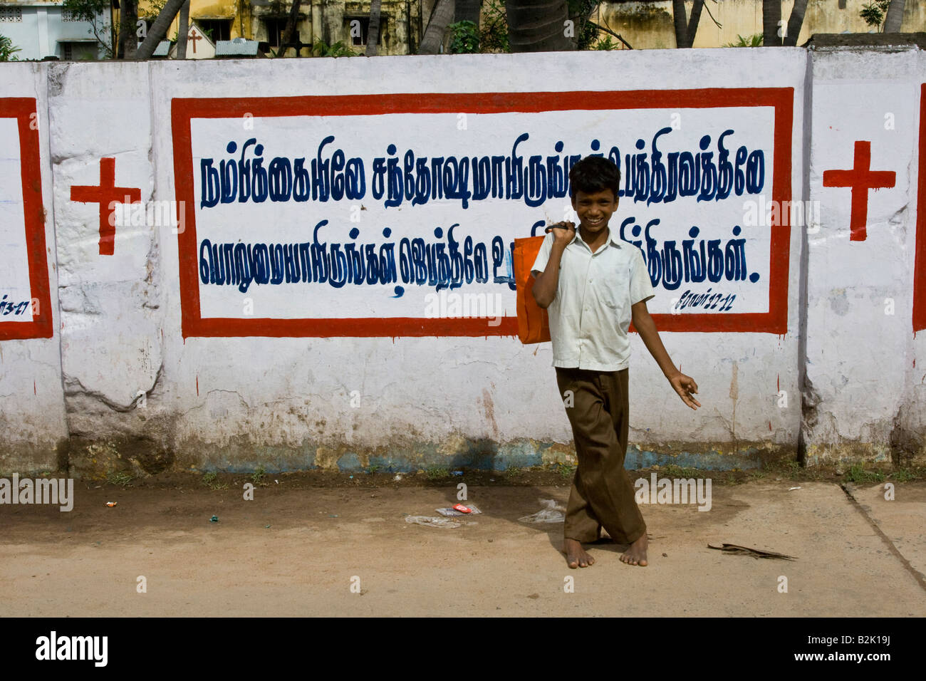 Boy Walking in front of a Christian Church in Kumbakonam South India ...