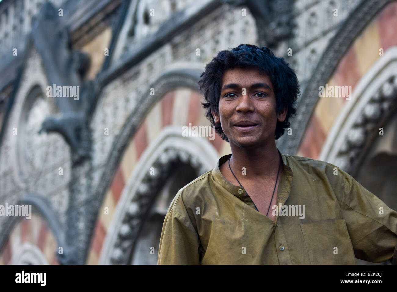 Homeless Boy in front of CST Building in Mumbai India Stock Photo - Alamy