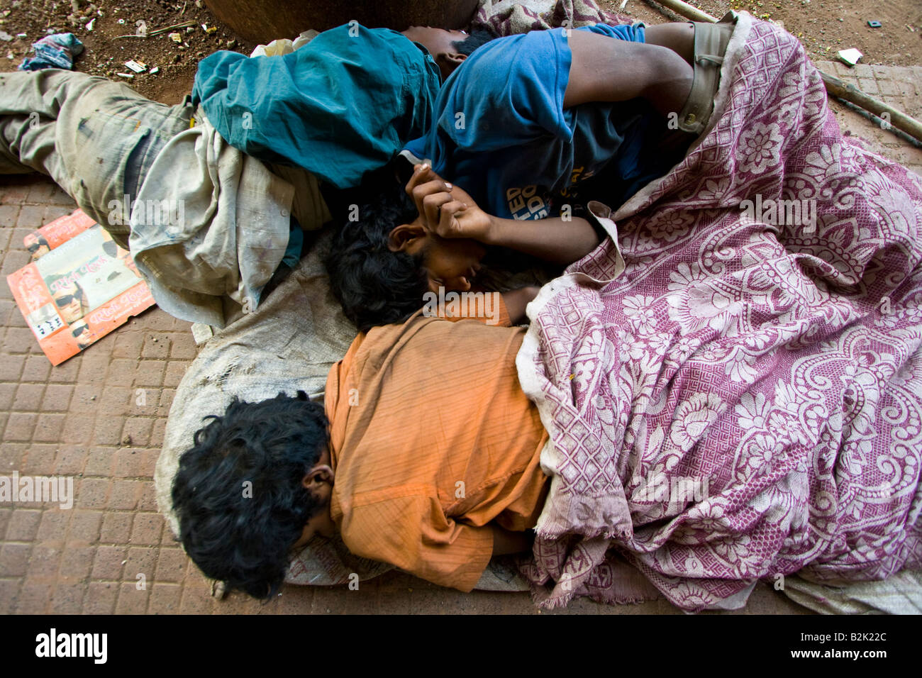 Homeless Boys Sleeping in the Streets of Mumbai India Stock Photo - Alamy