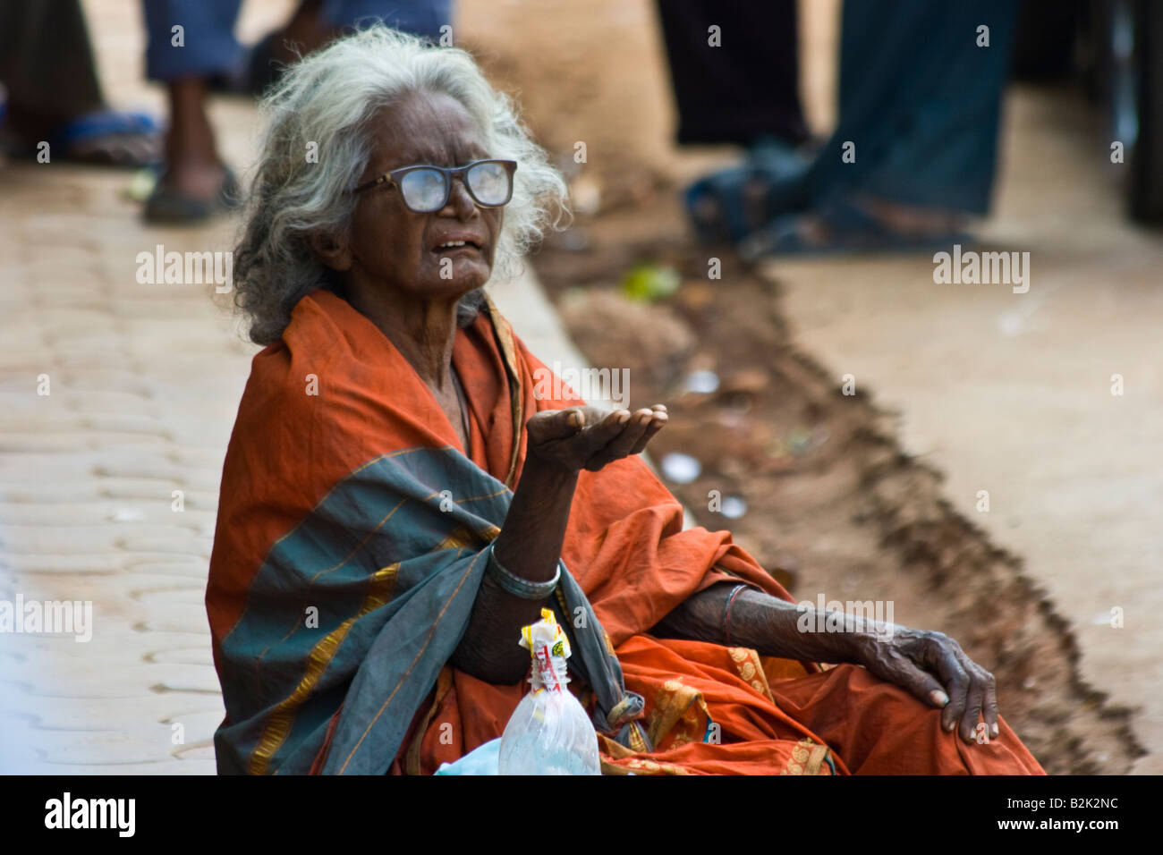 Old Homeless Woman Begging in the Streets of Mumbai India Stock Photo ...