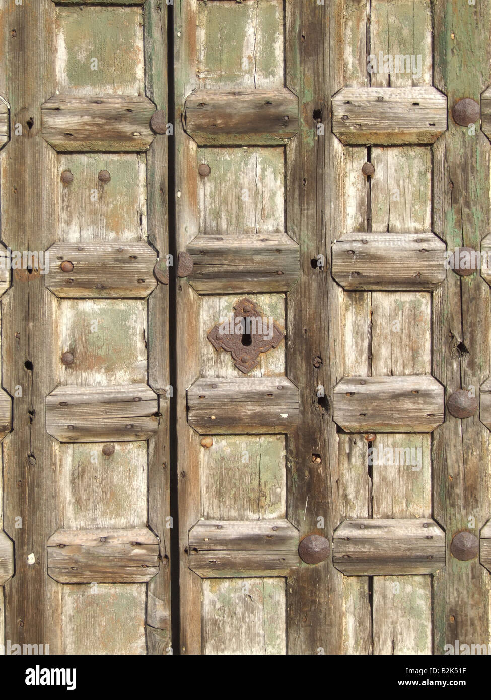 detail of big old green wooden door keyhole Stock Photo - Alamy
