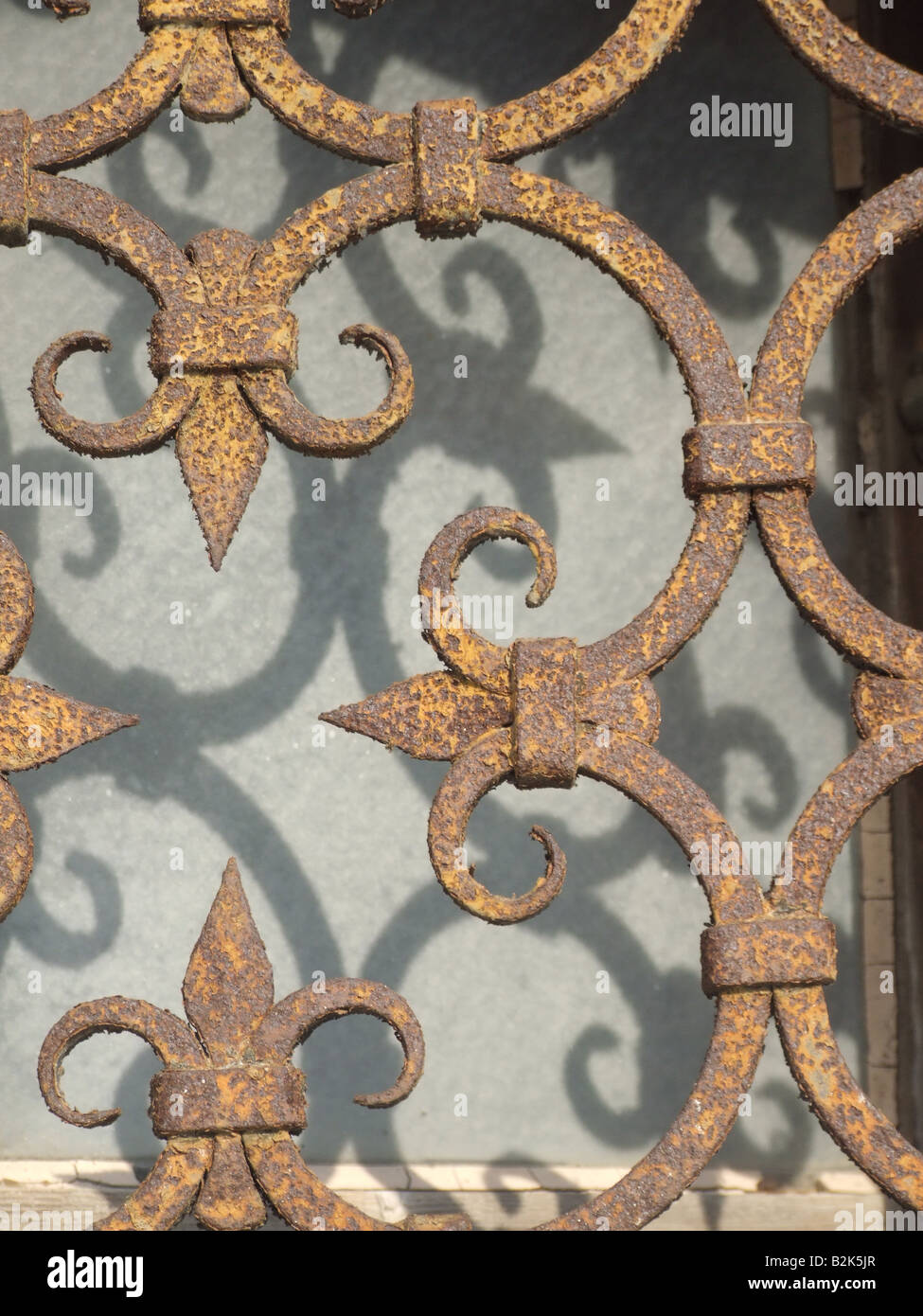 metal bars window grill shadow detail on wall in italy Stock Photo - Alamy