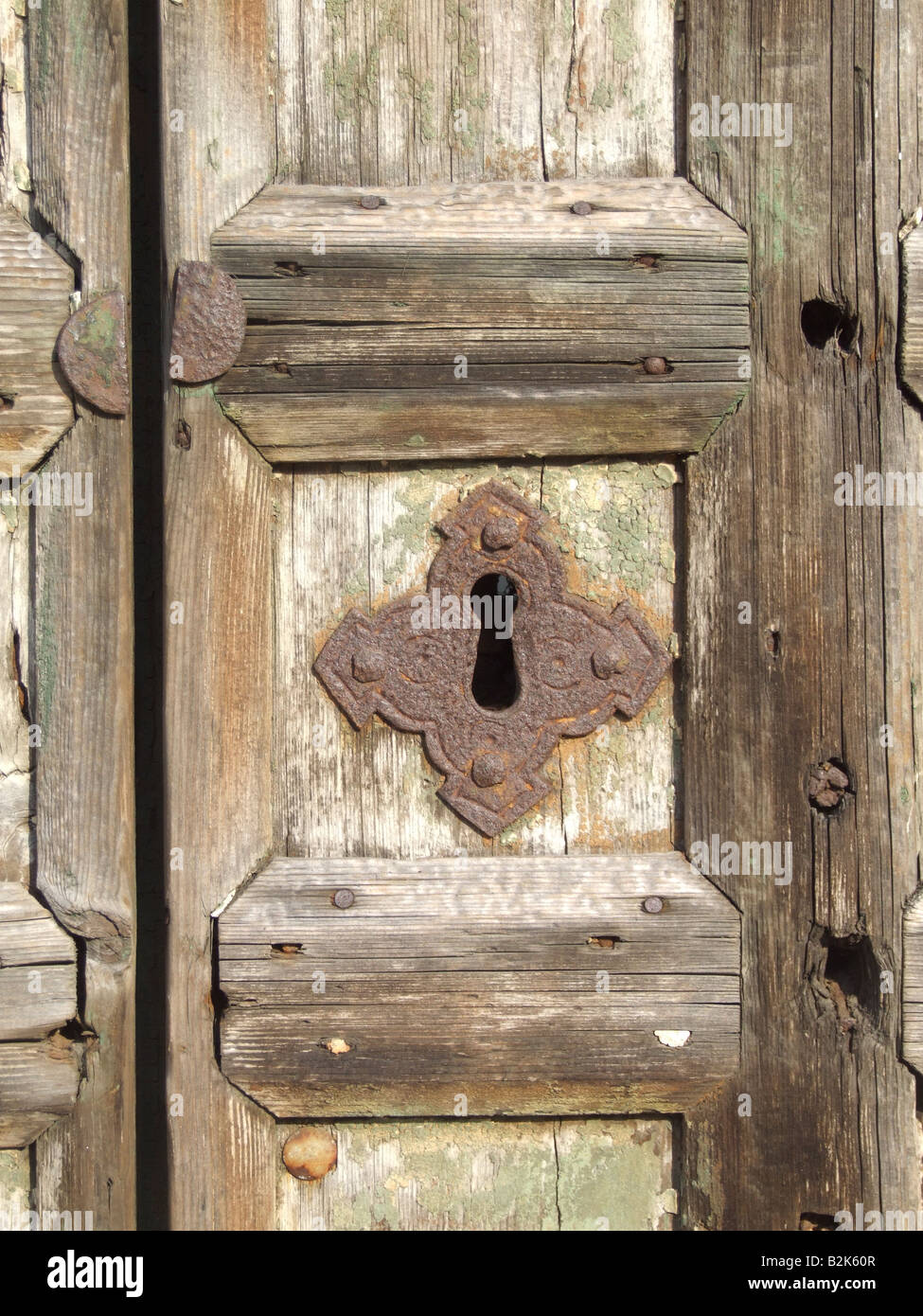 detail of big old green wooden door keyhole Stock Photo - Alamy