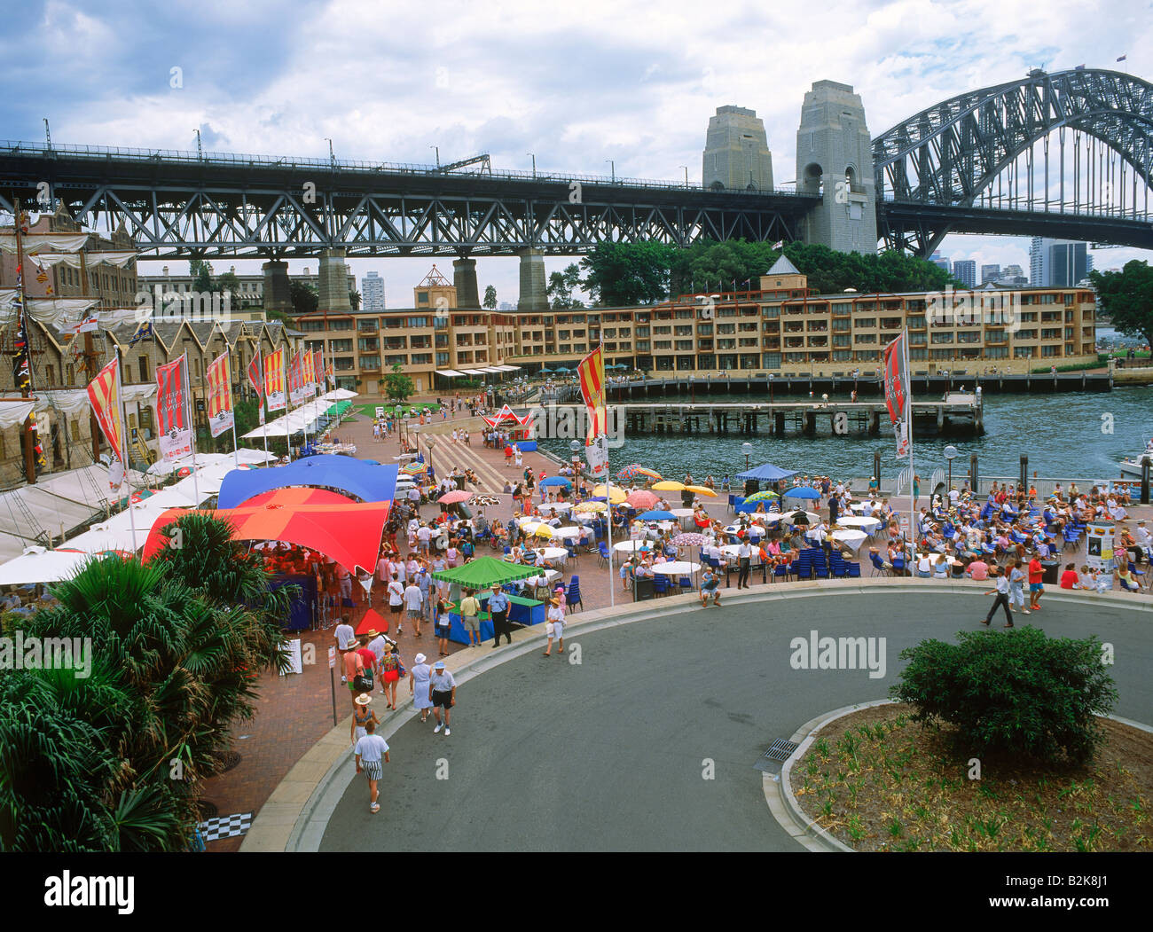 The Rocks area of Sydney with resturants and Harbour Bridge Stock Photo ...
