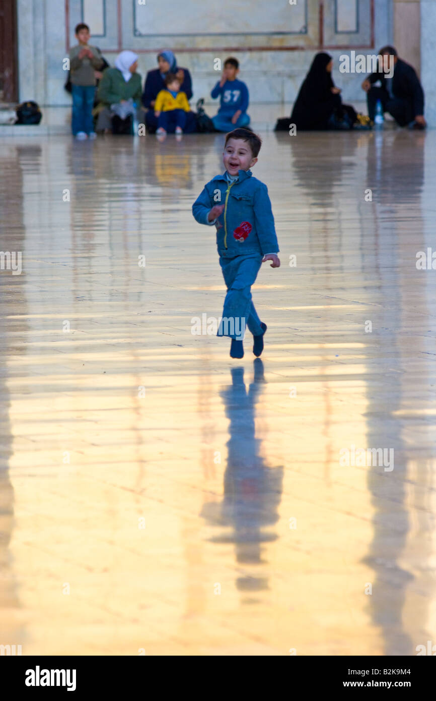 Muslim Boy Running inside the Umayyad Mosque in Damascus Syria Stock ...