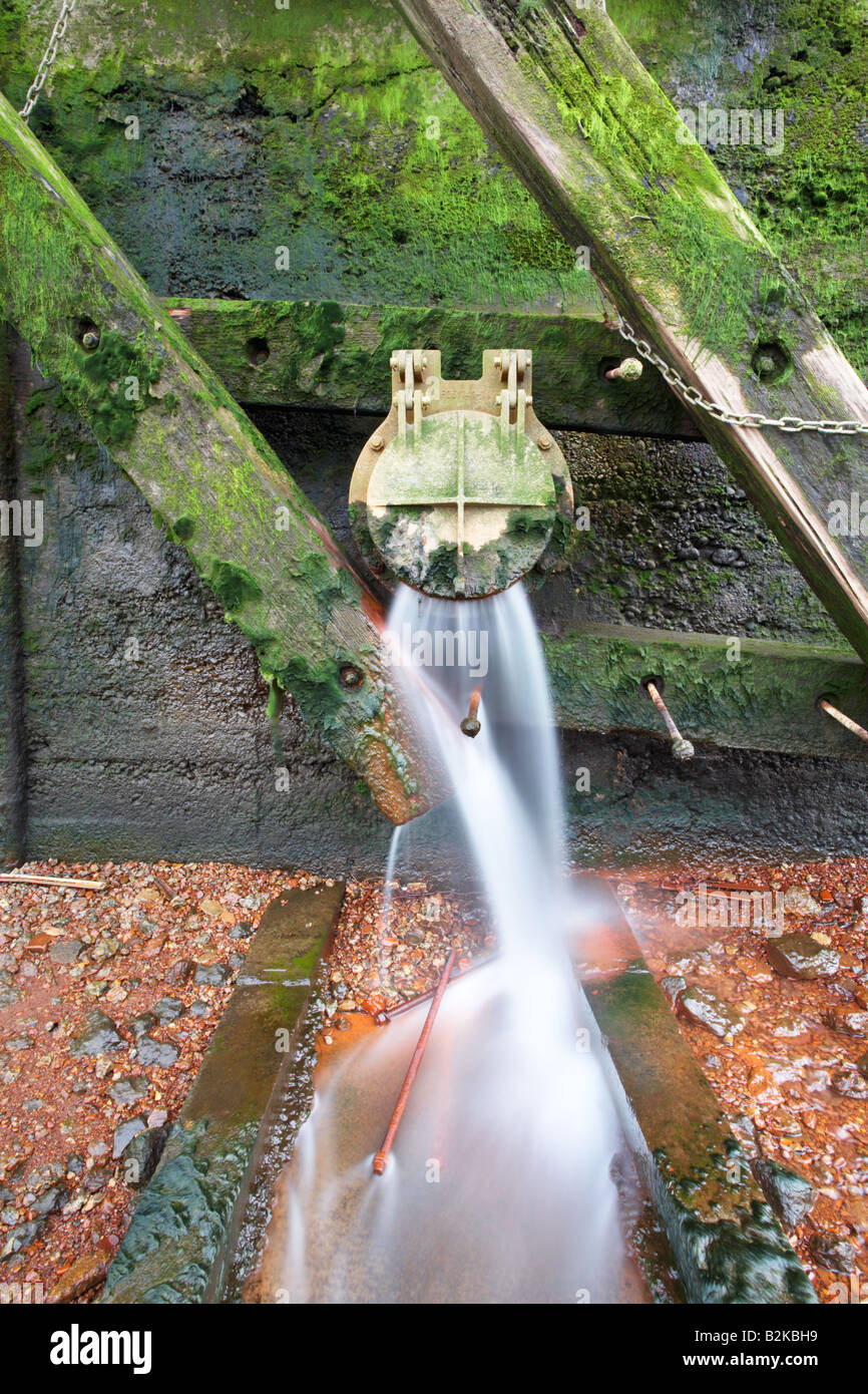 Sewage overflow outlet into the river Thames, London city, England, UK ...