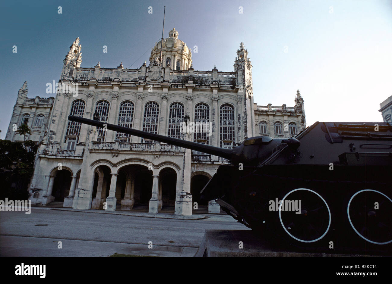 Military tank rolling past a grand old building in Havana, Cuba Stock ...