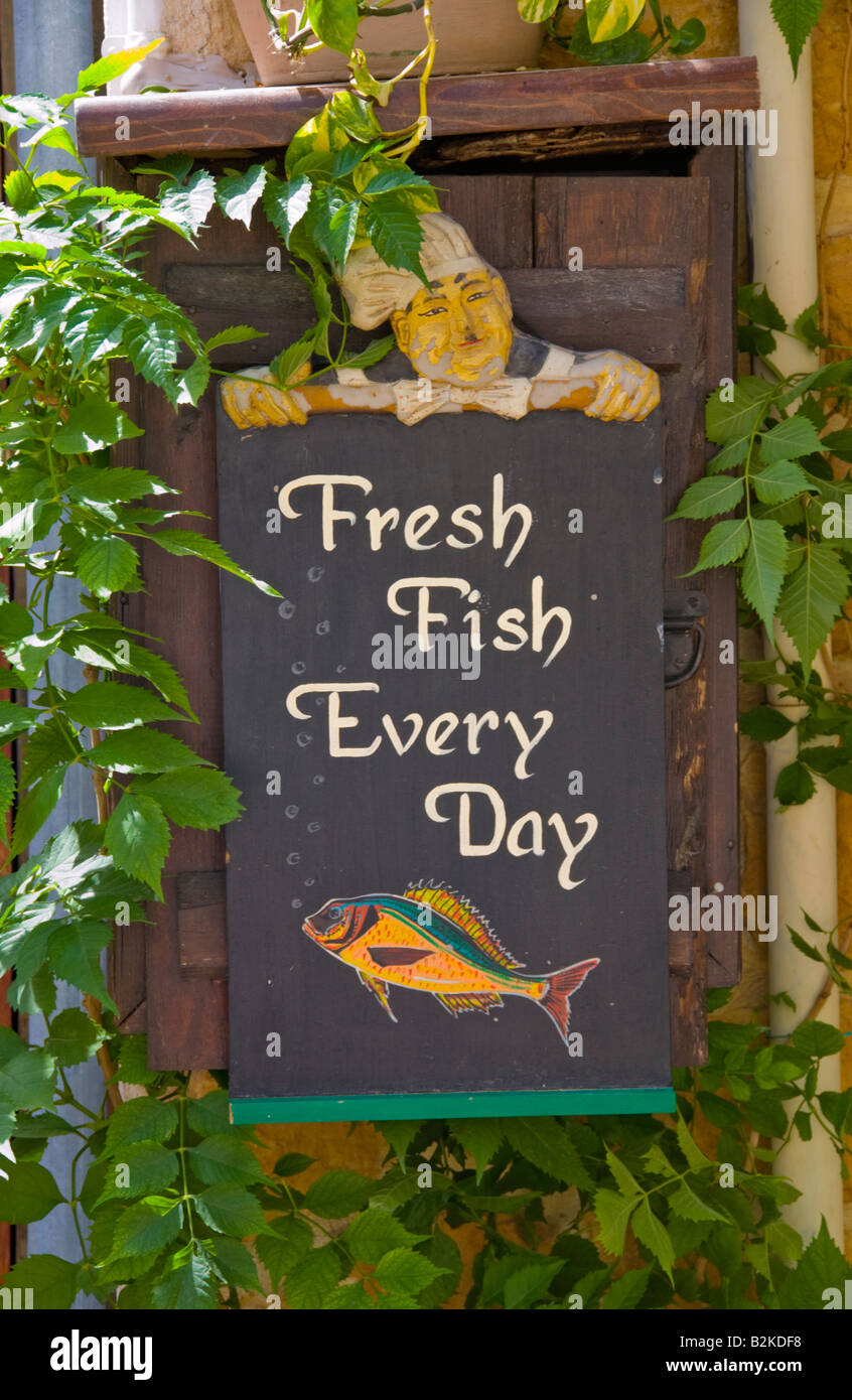 FRESH FISH EVERY DAY sign outside Taverna in Malia Old Town on the ...