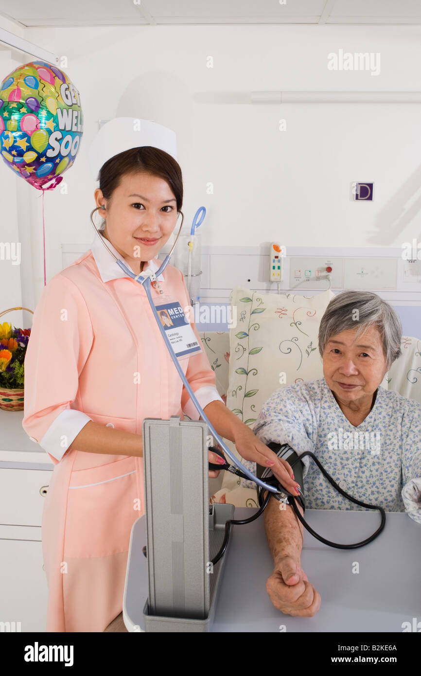Nurse checking patients id hi-res stock photography and images - Alamy