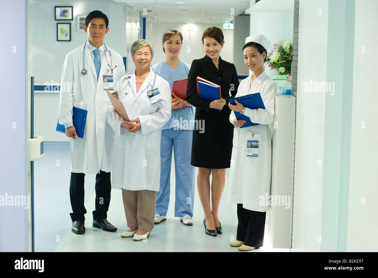 Portrait of medical staff standing in a corridor Stock Photo - Alamy
