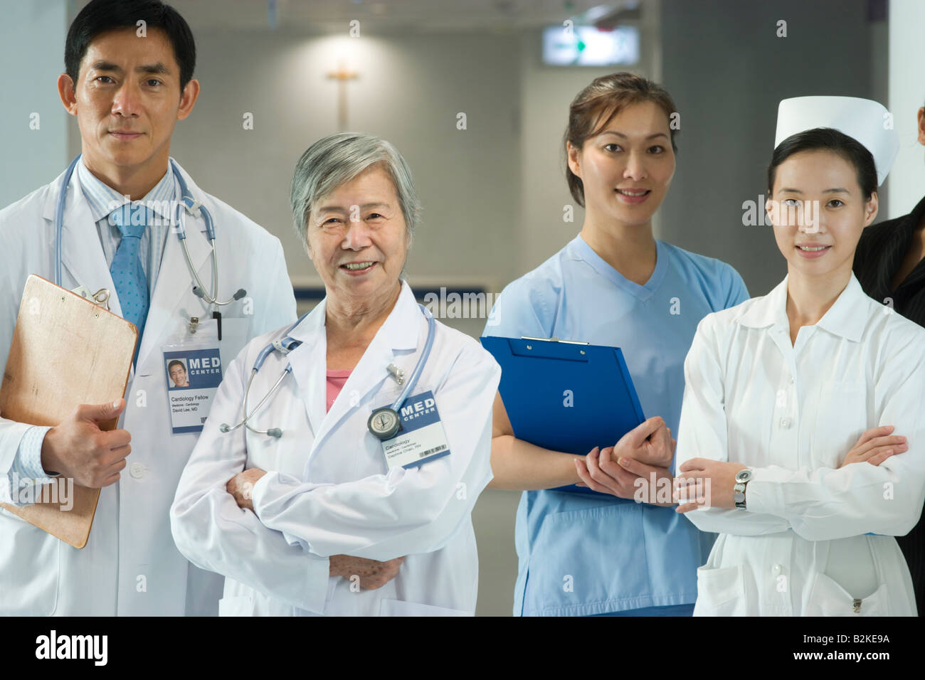 Portrait of medical staff standing together and smiling Stock Photo - Alamy