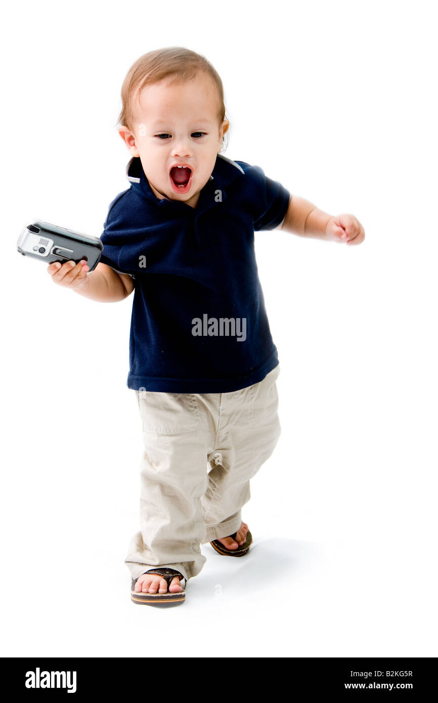 Baby running with phone in hand and mouth open isolated Stock Photo - Alamy