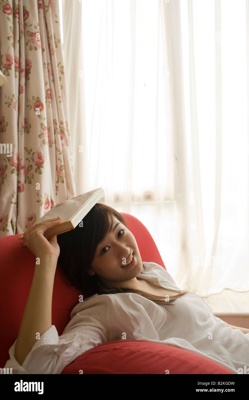 Young asian woman keeping hi-res stock photography and images - Alamy