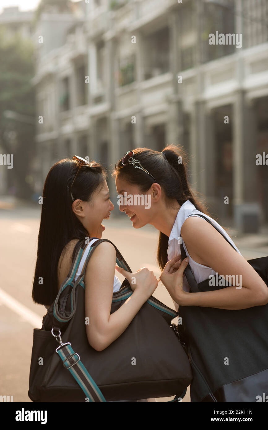 Two joyful women smiling hi-res stock photography and images - Alamy