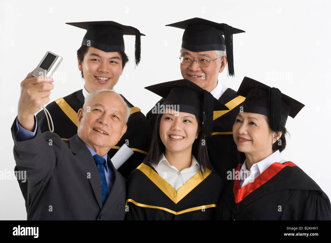 Professor with his students photographing themselves Stock Photo - Alamy