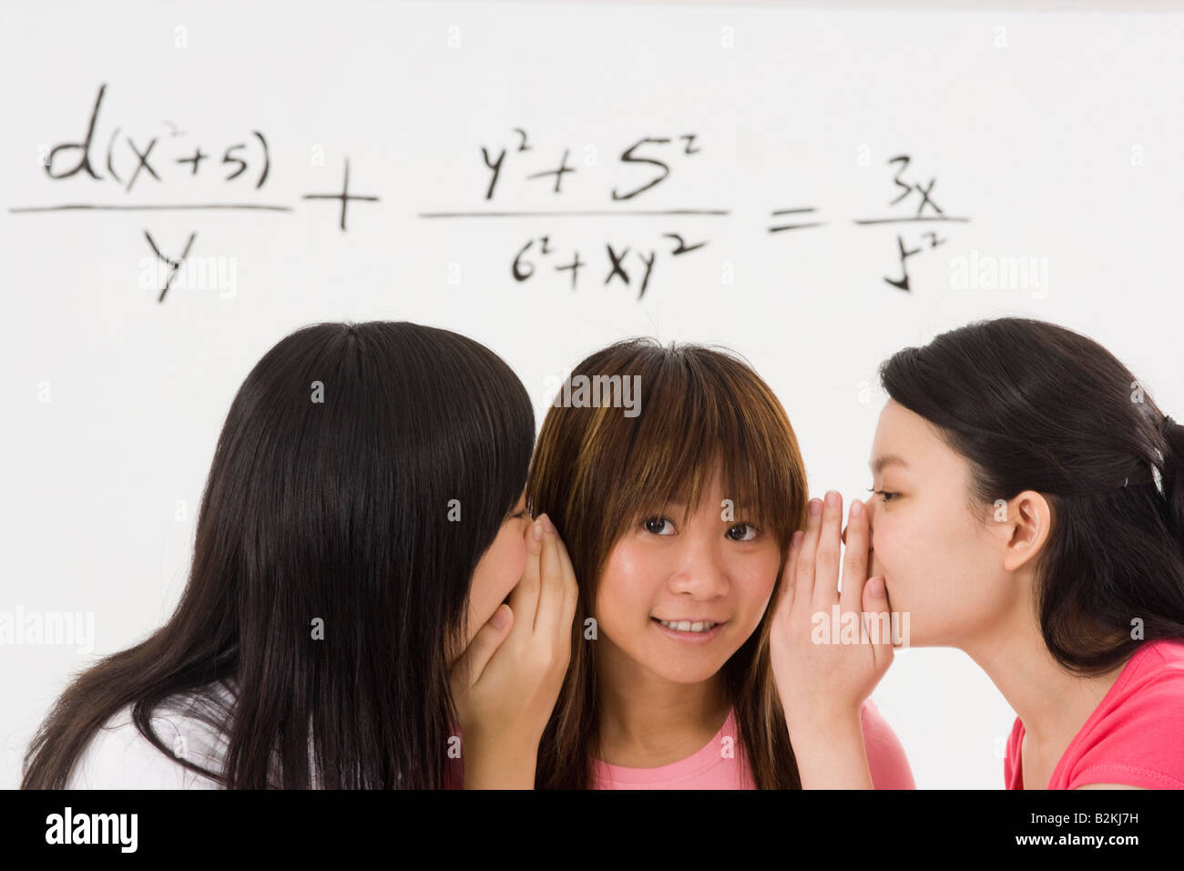 Students whispering classroom hi-res stock photography and images - Alamy