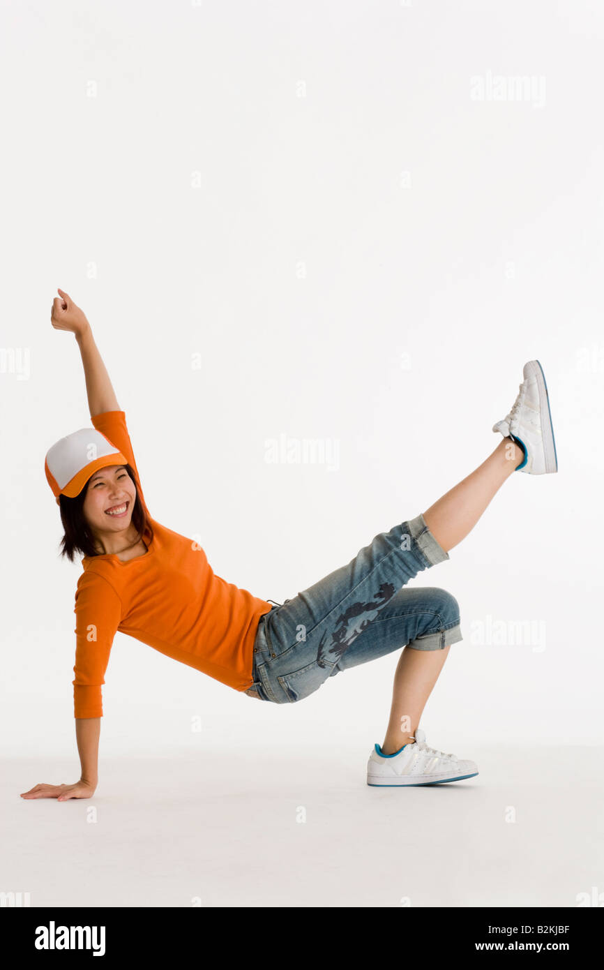 Side profile of a young woman dancing Stock Photo - Alamy