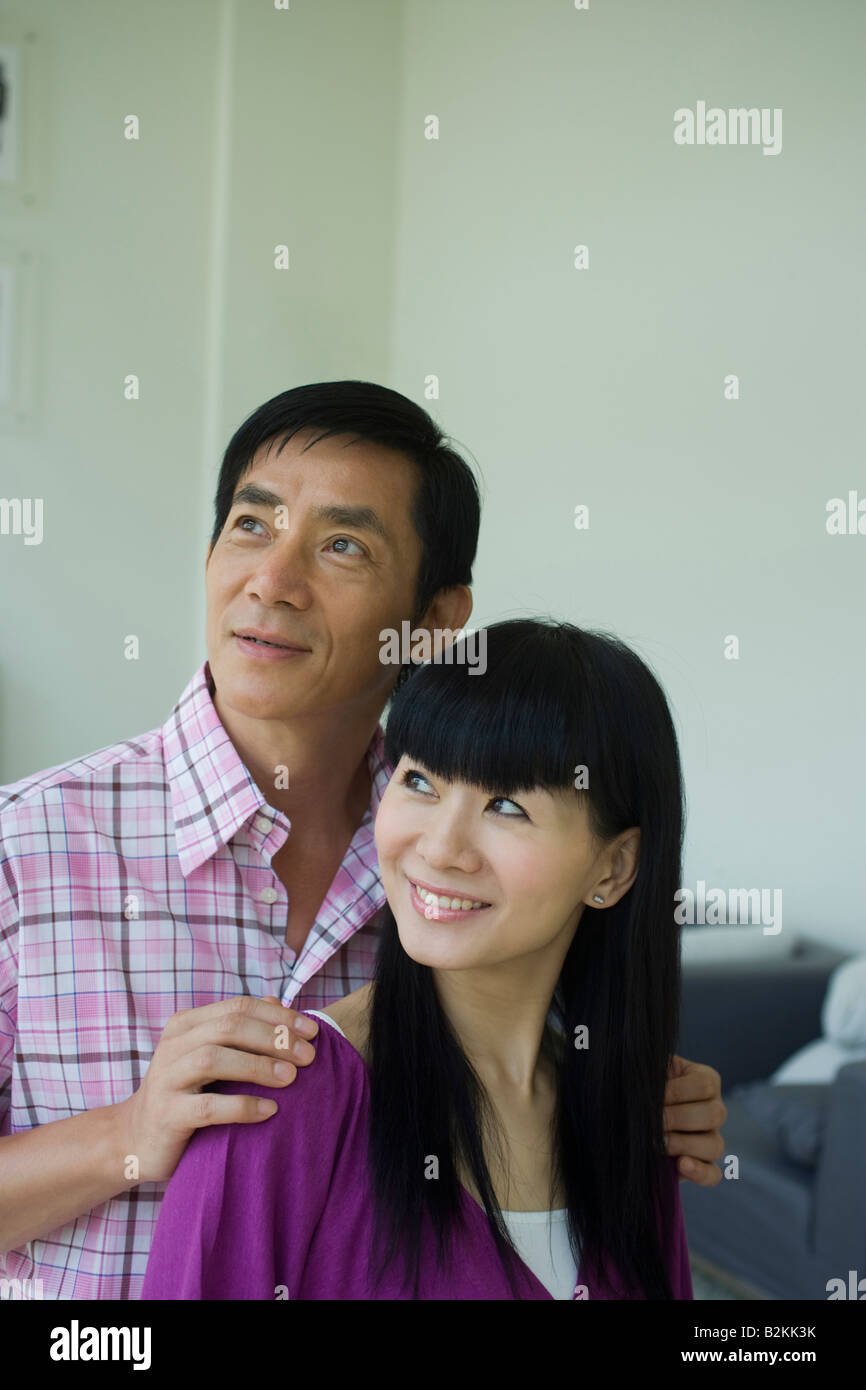 Mid adult couple smiling Stock Photo - Alamy