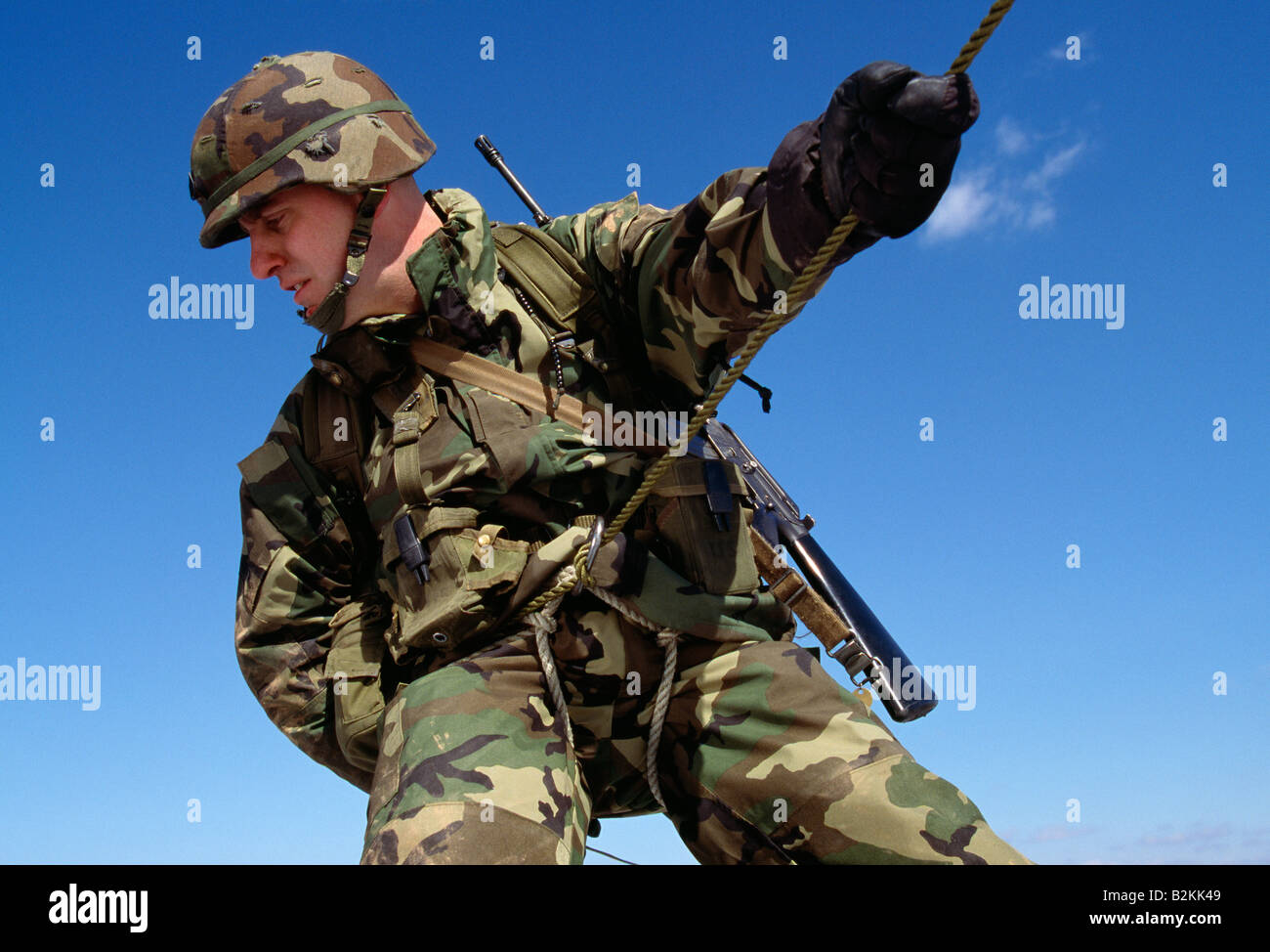 Soldier leaning on rifle hi-res stock photography and images - Alamy