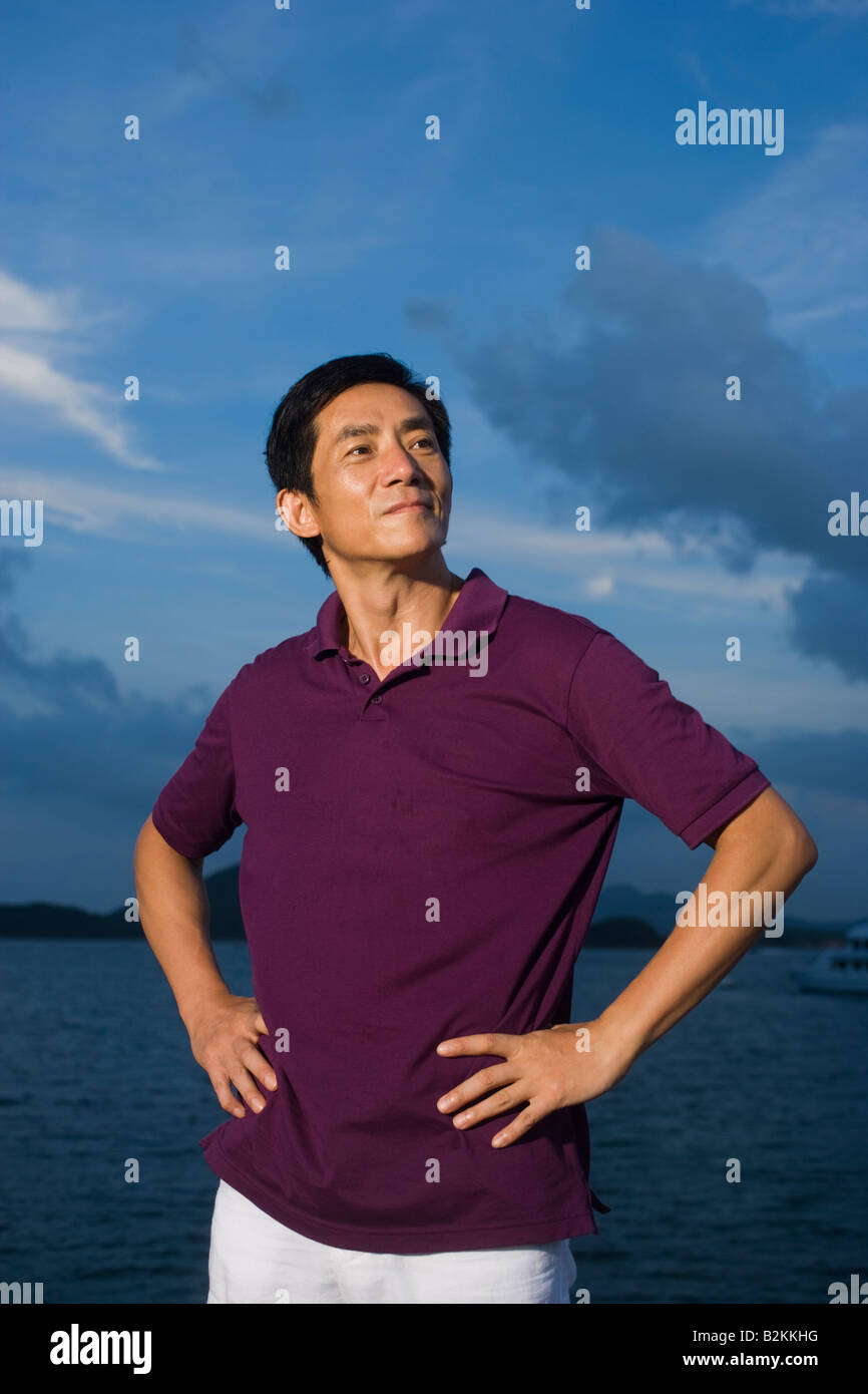Confidence arms akimbo man hi-res stock photography and images - Alamy
