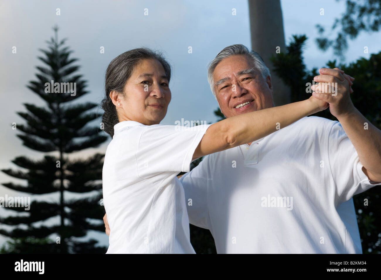 Portrait of a senior couple dancing Stock Photo - Alamy