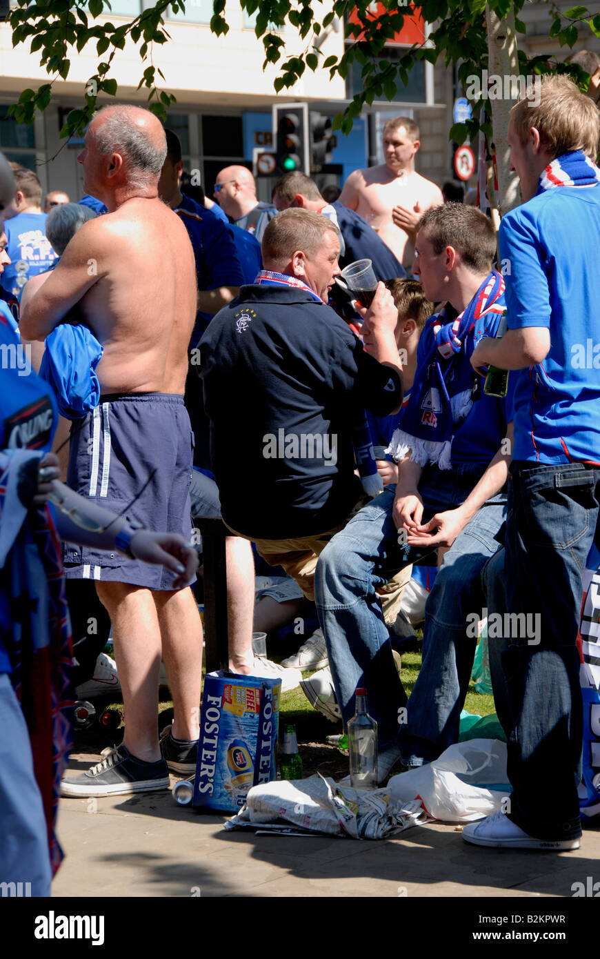 Glasgow rangers fans drink in manchester city centre in their thousands ...