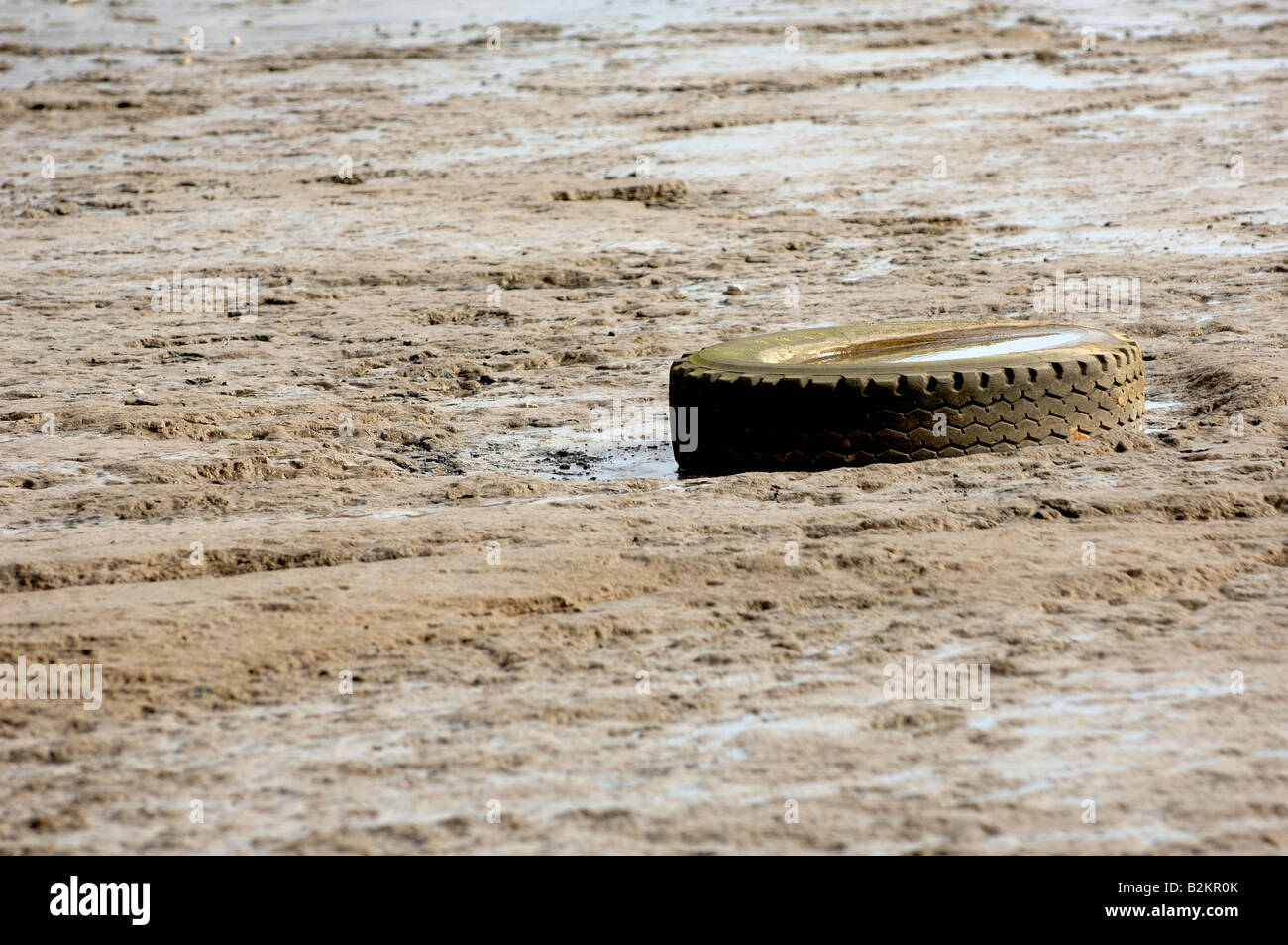 rubbish dumped on river bank Stock Photo - Alamy