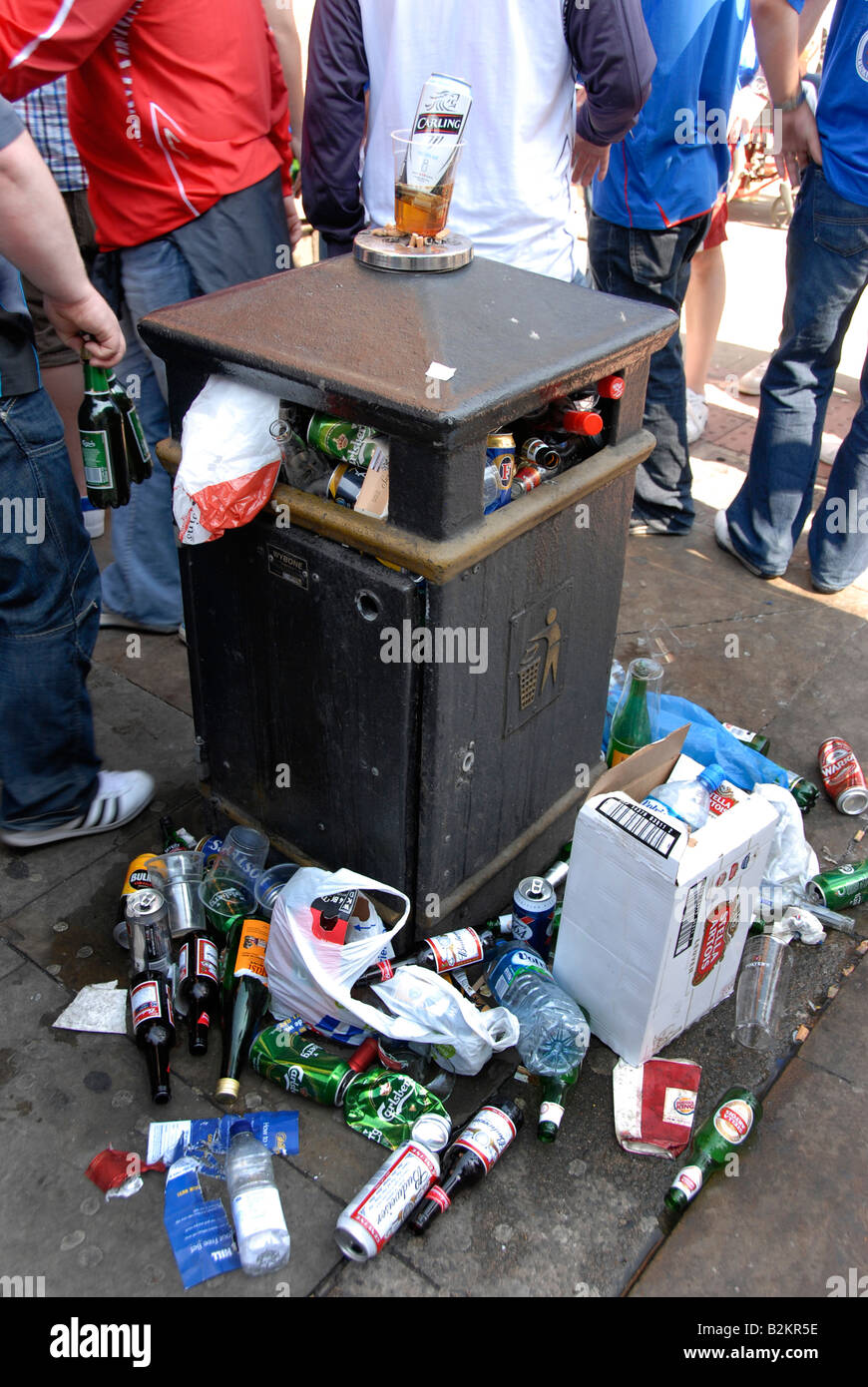 Alcoholic drinks containers around litter bin in Manchester City centre ...