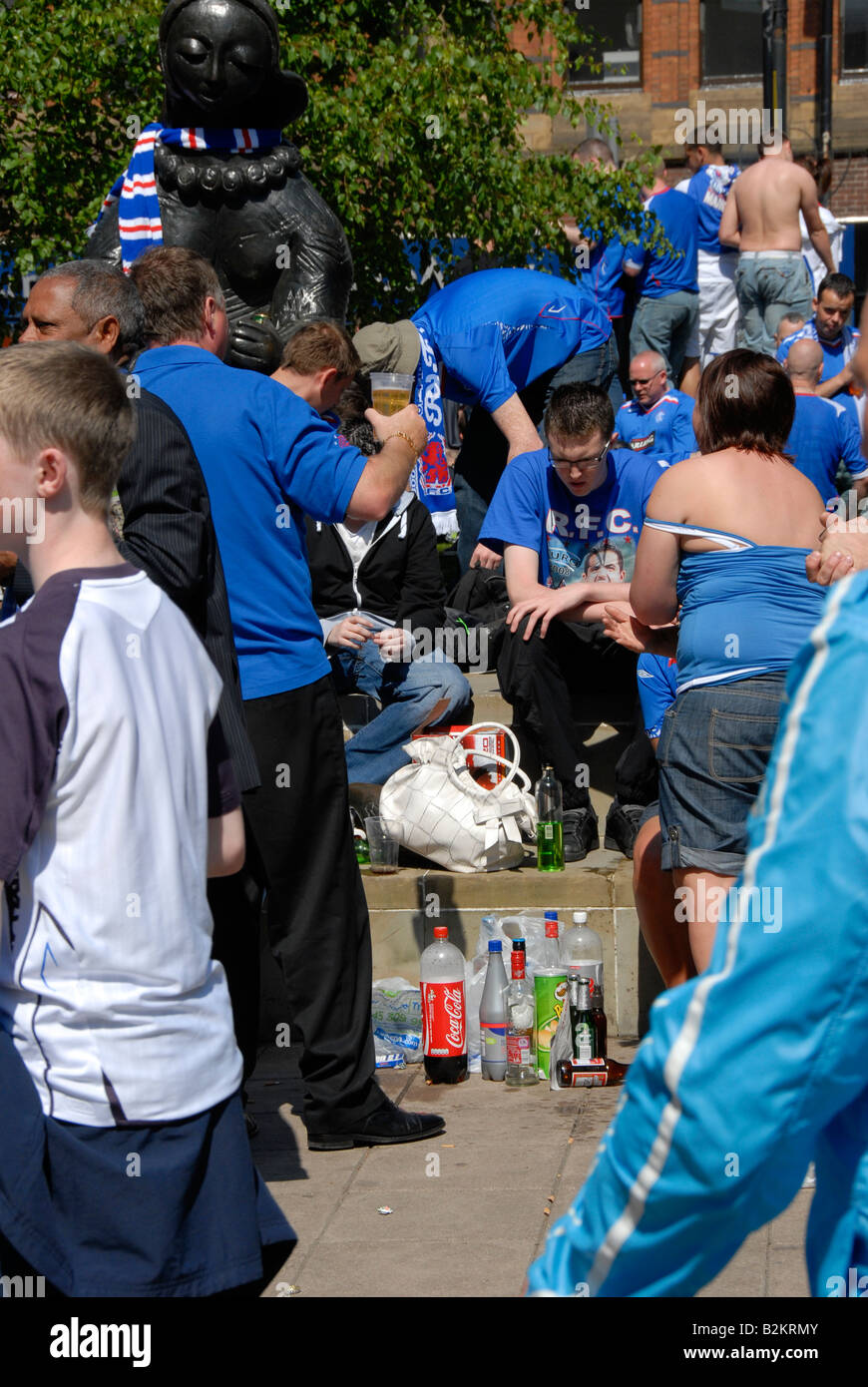 Glasgow rangers fans drink in manchester city centre in their thousands ...