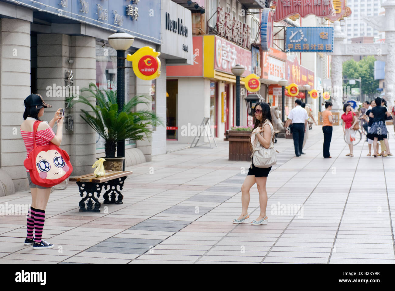 Chinese Girls Taking Photos, Hunan Road, Nanjing, China Stock Photo - Alamy