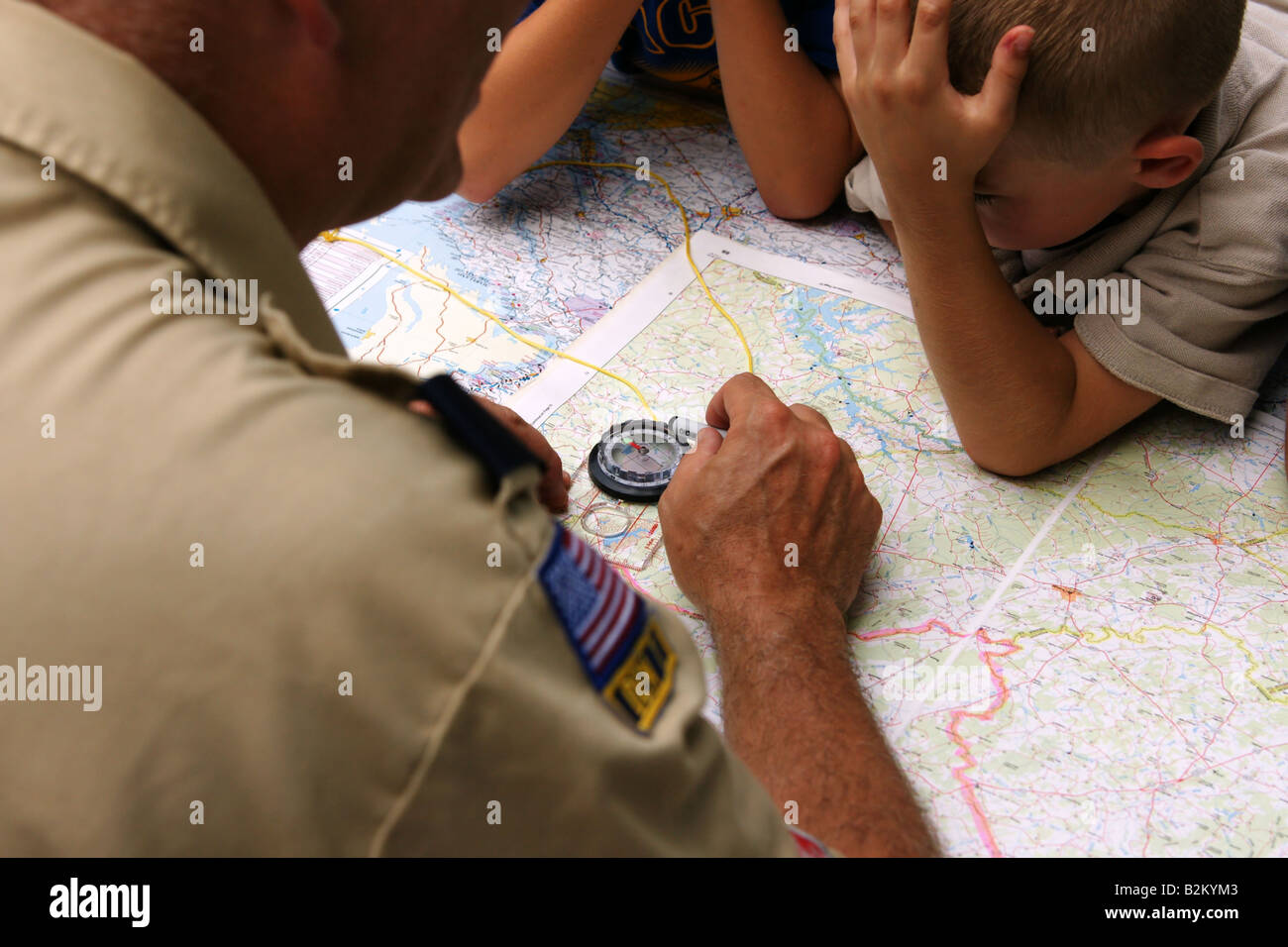 Orienteering education with map and compass Stock Photo - Alamy