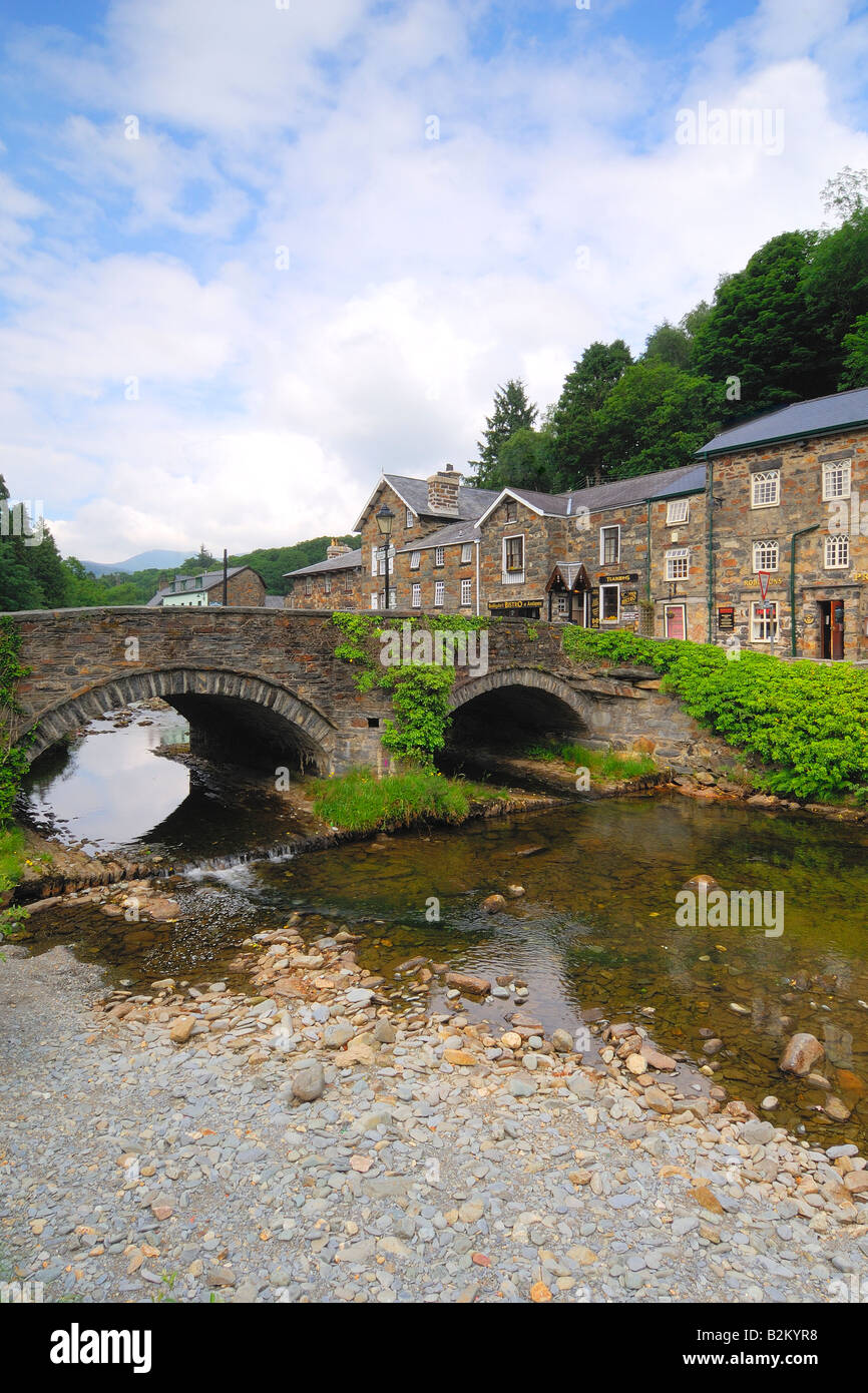 The ivy covered bridge carrying the A4085 over the River Glaslyn at ...