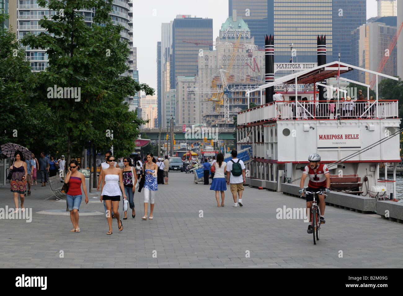 A beautiful summer day along Toronto Harbour at Queens Quay Terminal ...