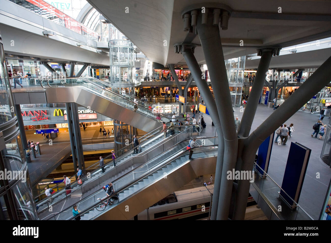 Interior of large new modern main railway station Hauptbahnhof in ...