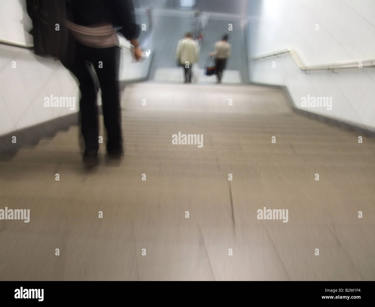 Woman walking alone in subway hi-res stock photography and images - Alamy