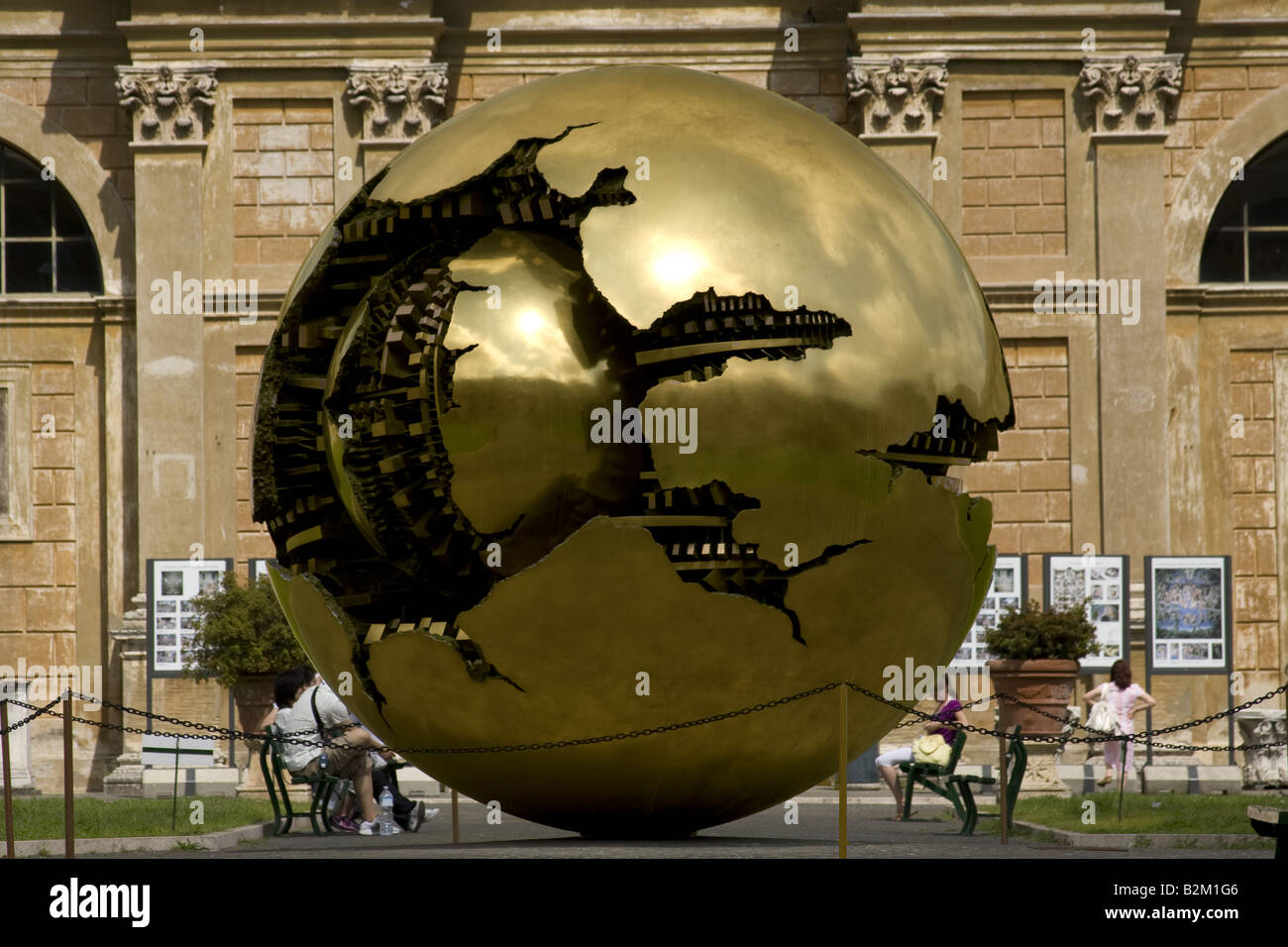 Golden ball world in world symbol of Vatican Stock Photo - Alamy