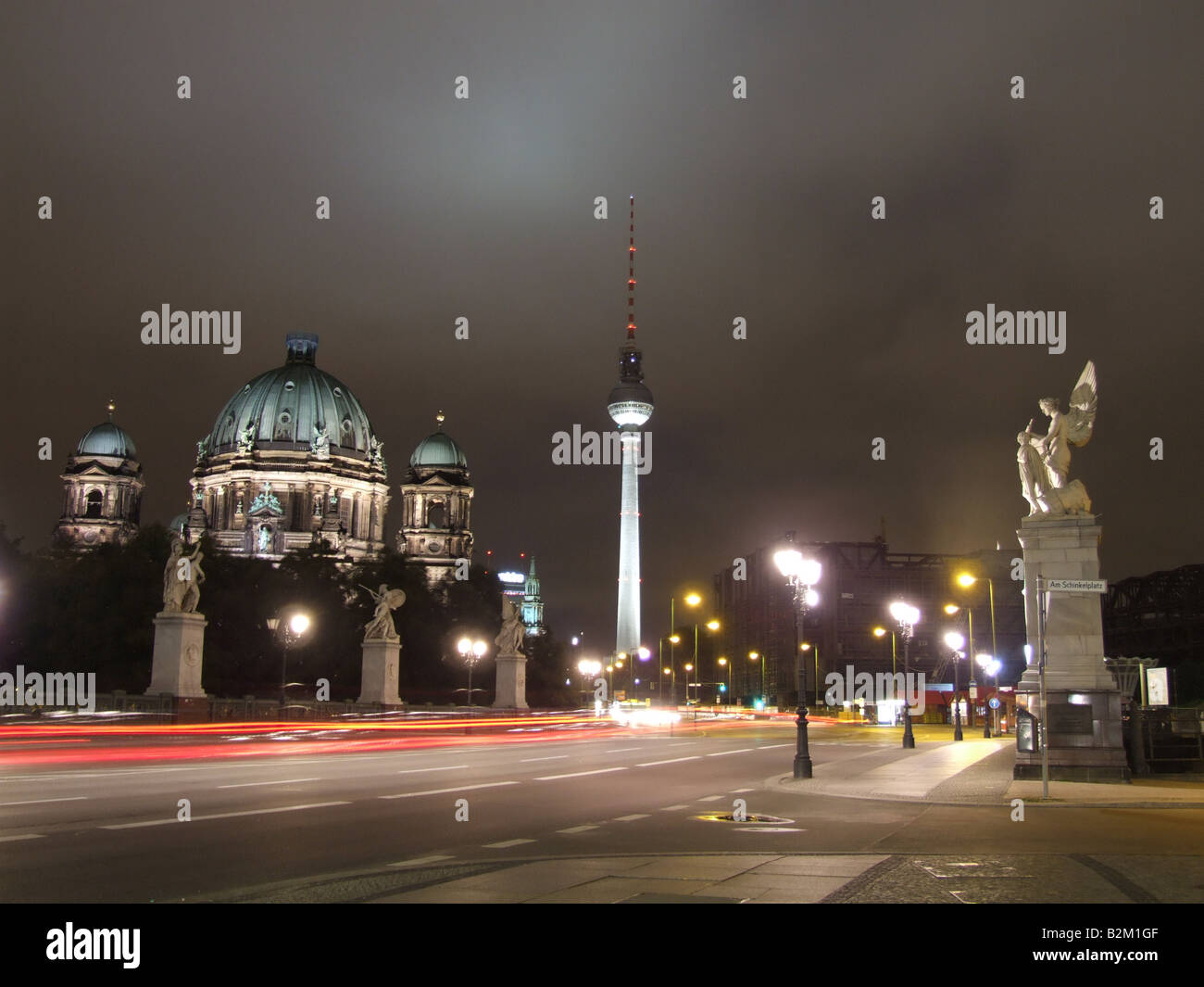 berlin cathedral and tv tower illuminated at night Stock Photo - Alamy