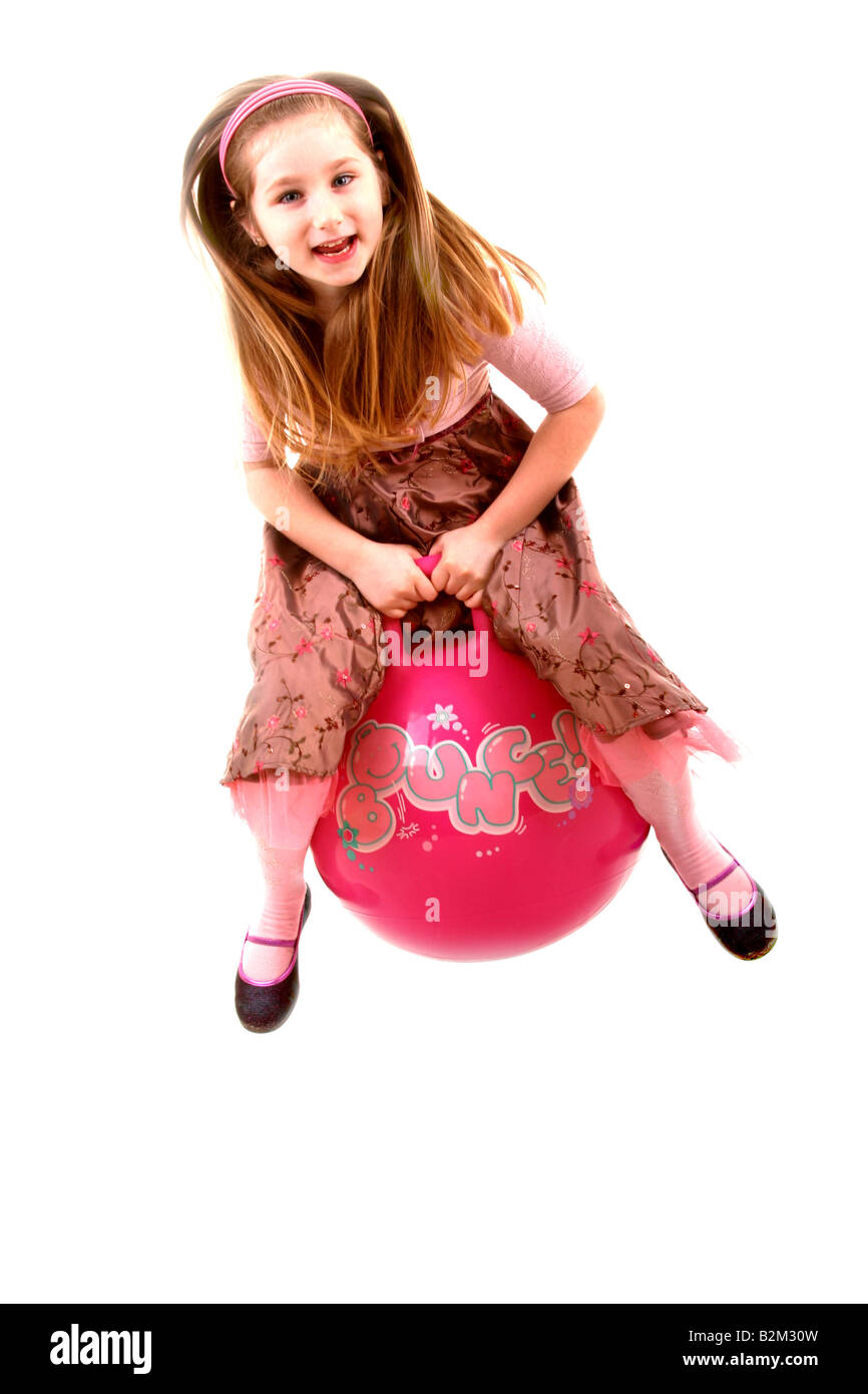 Girl on a Spacehopper Stock Photo - Alamy