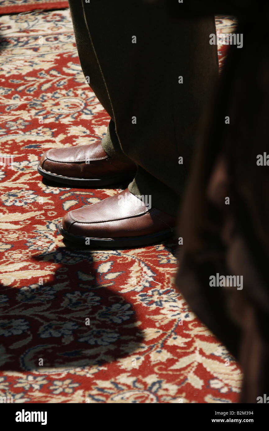 person standing on floral carpet outdoors in sun Stock Photo - Alamy
