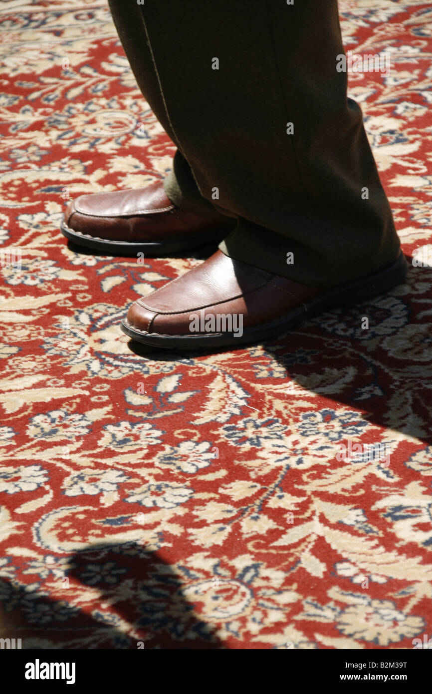 person standing on floral carpet outdoors in sun Stock Photo - Alamy