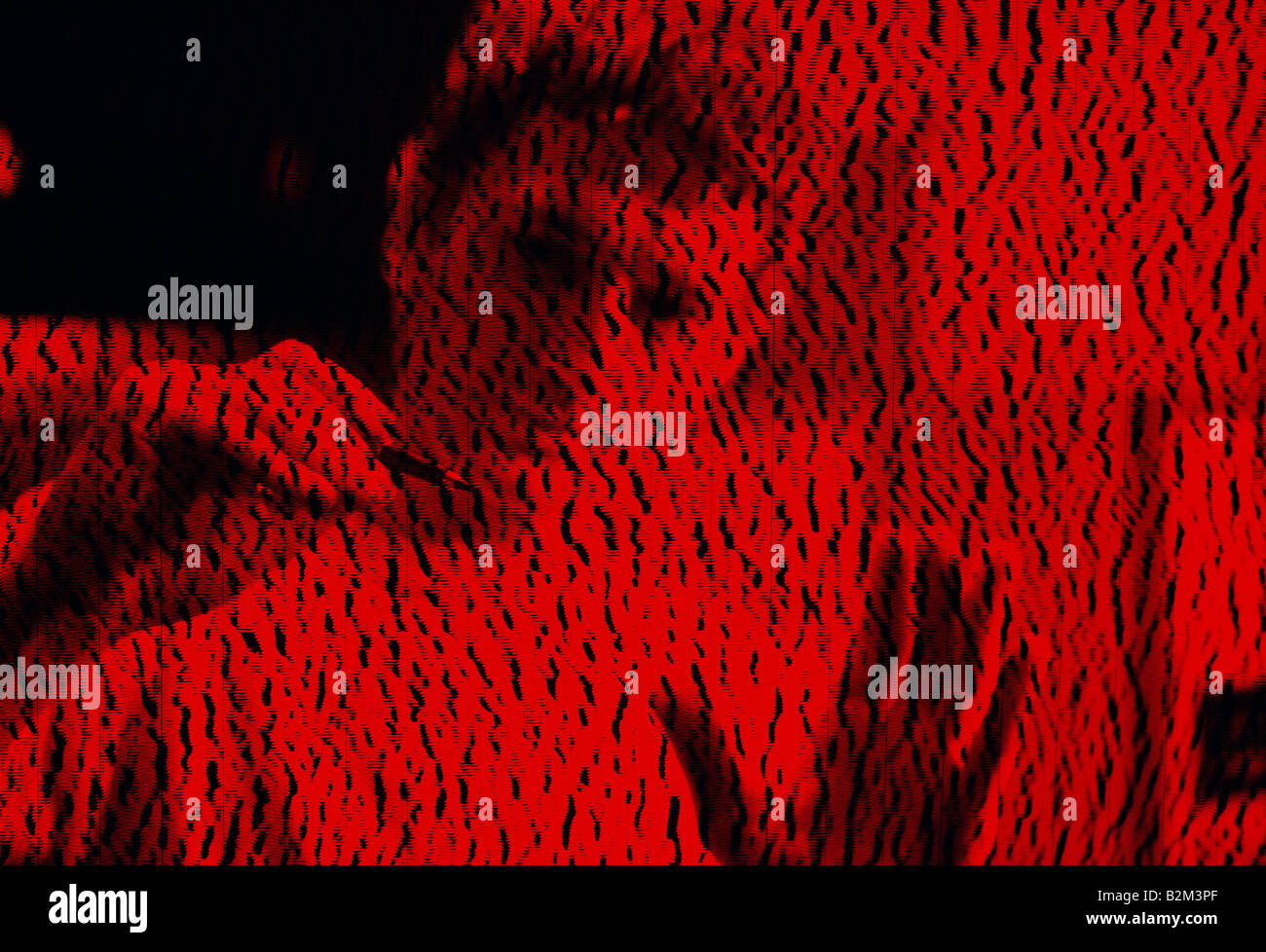 Scientist examining a film print out of geological data Stock Photo - Alamy