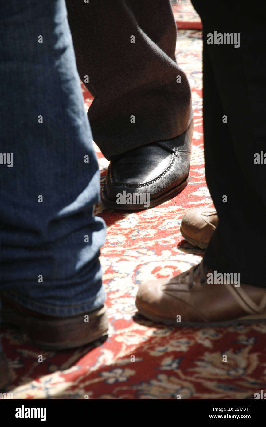 people standing on floral carpet outdoors in sun Stock Photo - Alamy