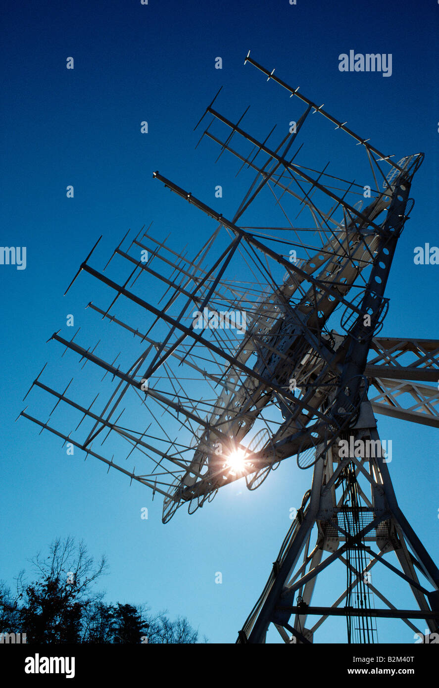 Backlit view of large telecommunications antennae Stock Photo - Alamy