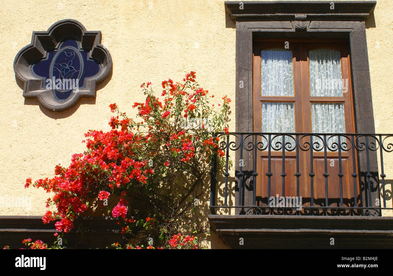 Mexico window with red bougainvillea flowers on a balcony Stock Photo ...