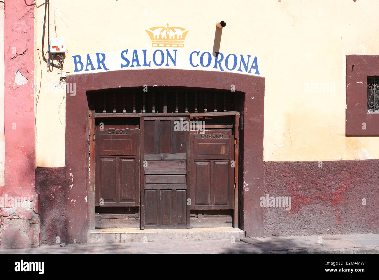 Wood doors on old Mexico bar Stock Photo - Alamy