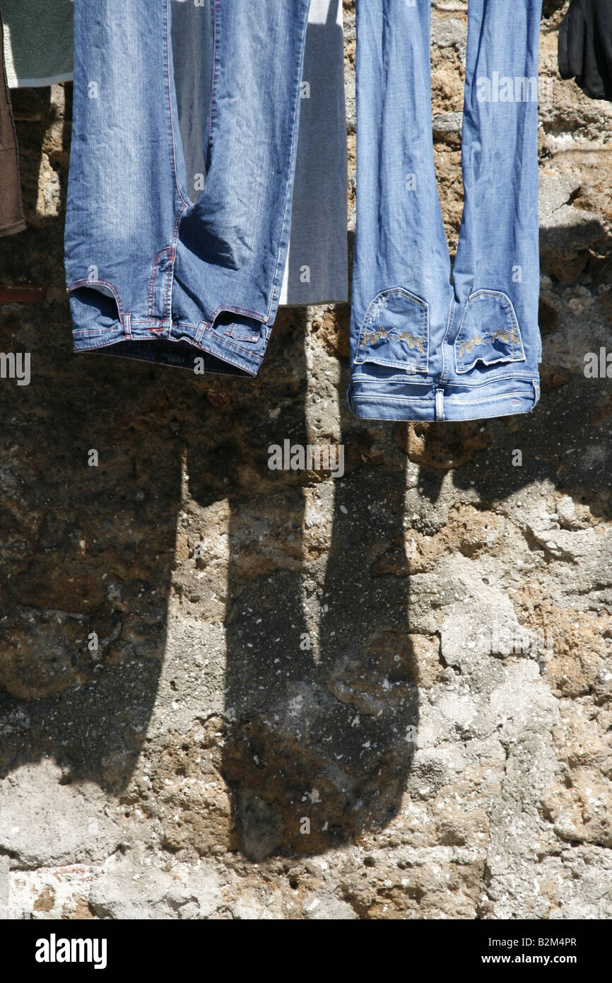 clothes on washing line outdoors in sun in italy Stock Photo - Alamy