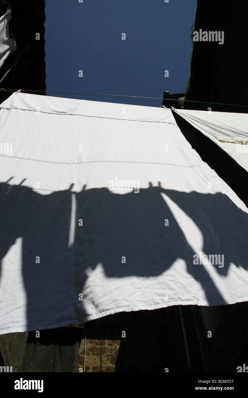 clothes on washing line outdoors in sun in italy Stock Photo - Alamy