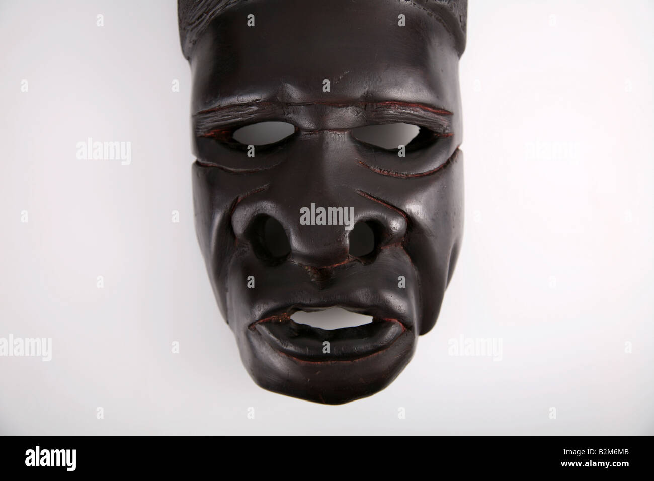 African Mask from Zambia on a white background Stock Photo - Alamy