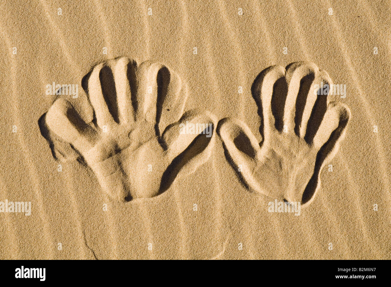Hands drawn in the sand Stock Photo - Alamy